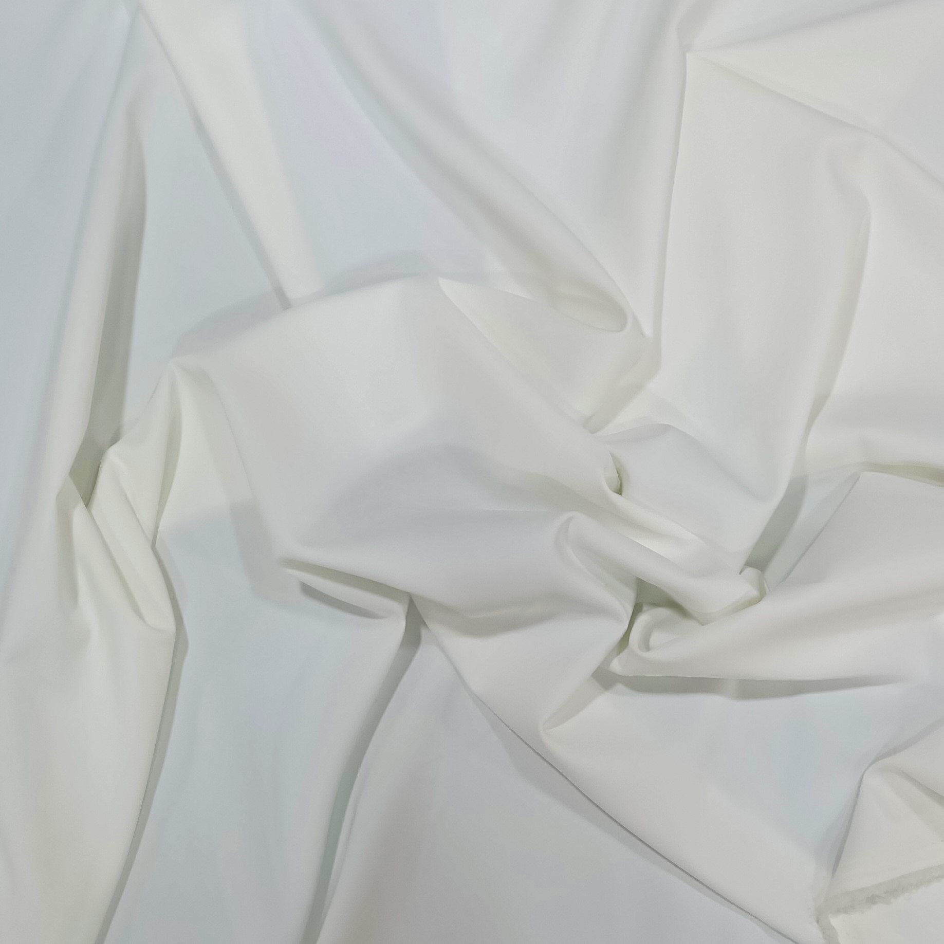 Tela bielástico color blanco roto - Tu tienda de Telas